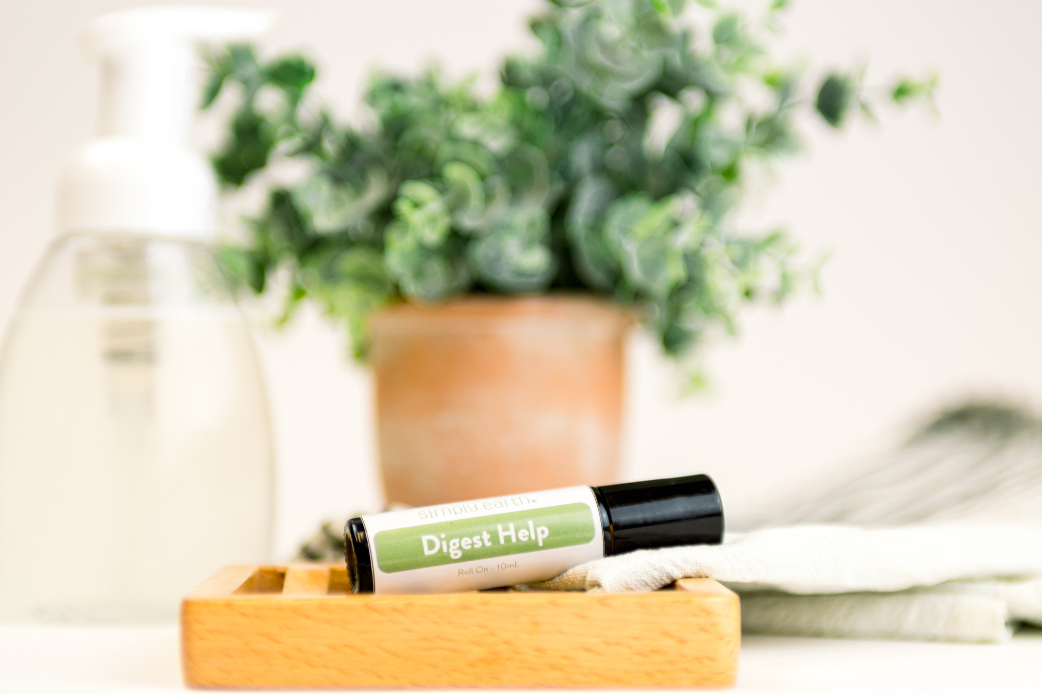 Best Essential Oils for Digestion - Simply Earth Blog